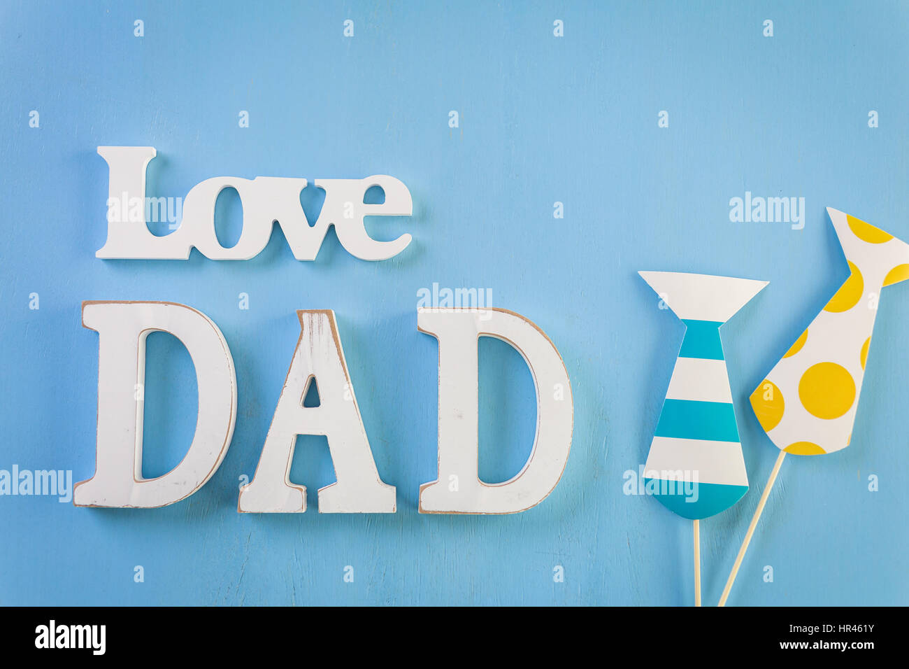 White letters DAD on a painted wood background Stock Photo - Alamy