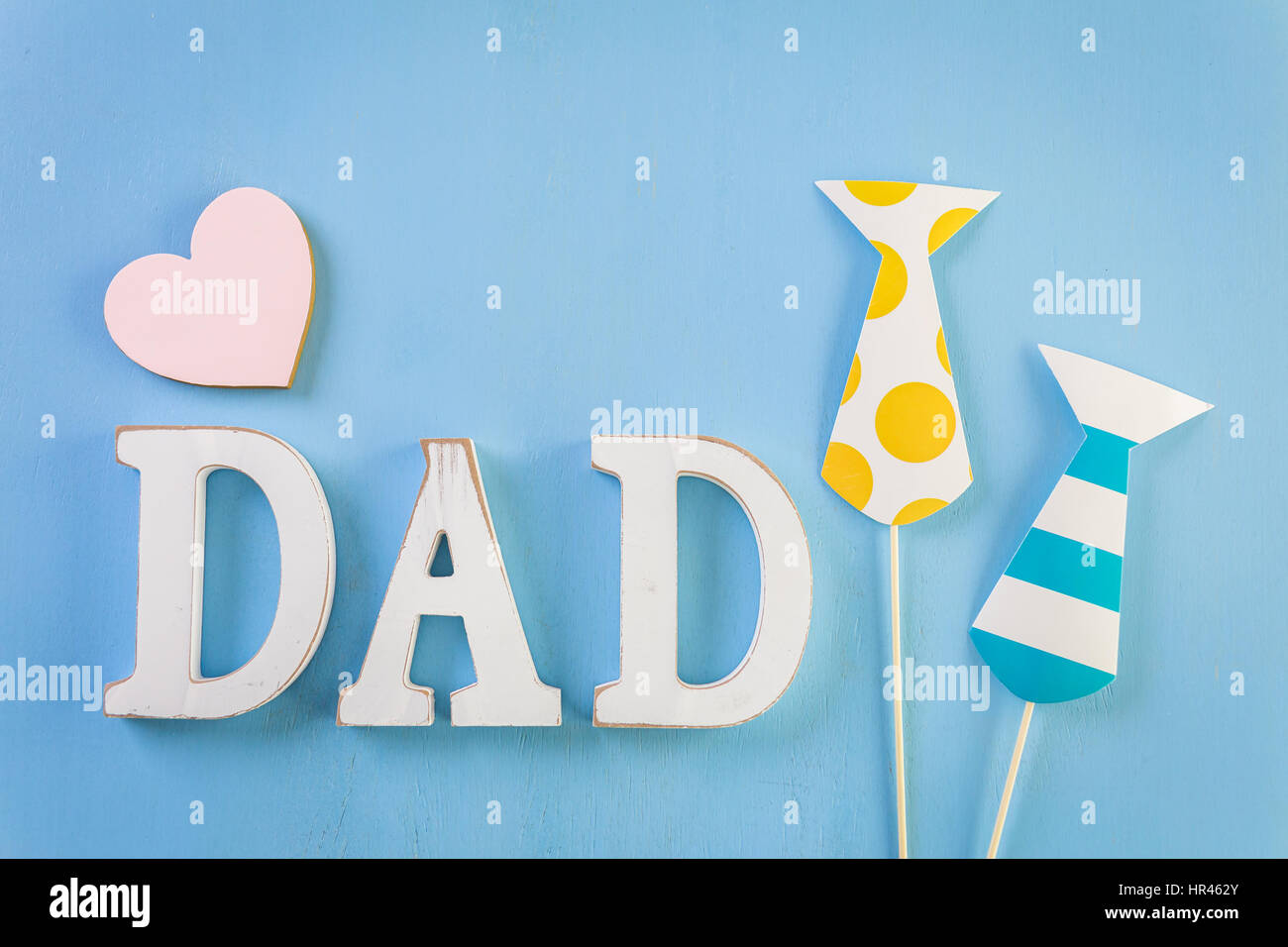 White letters DAD on a painted wood background Stock Photo - Alamy