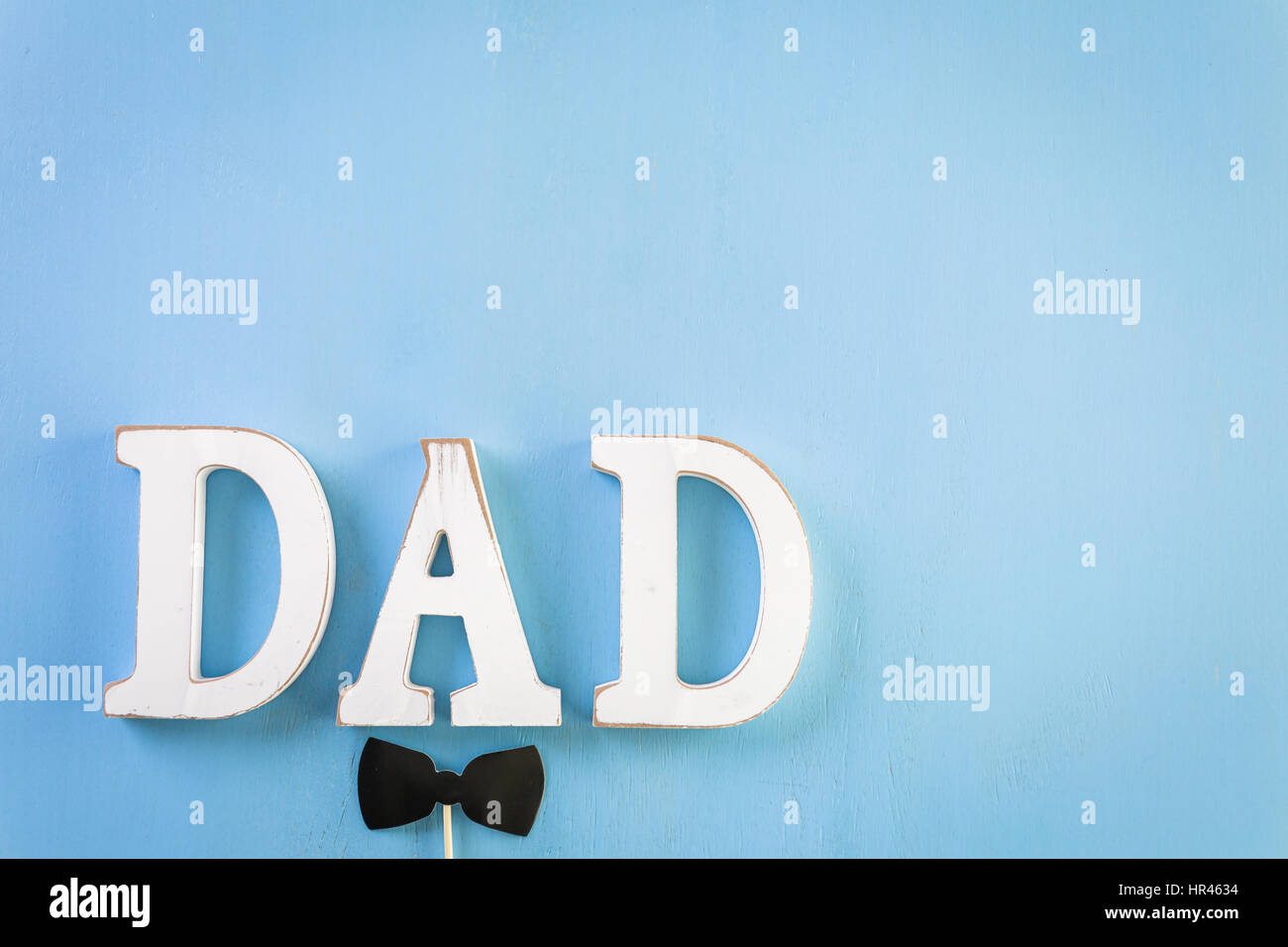 White letters DAD on a painted wood background Stock Photo - Alamy