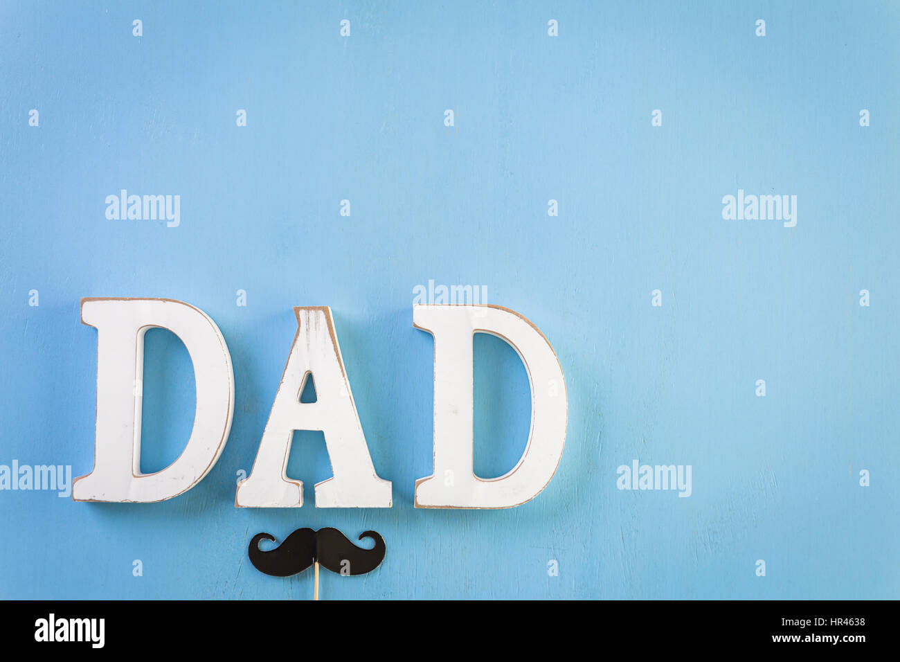 White letters DAD on a painted wood background Stock Photo - Alamy