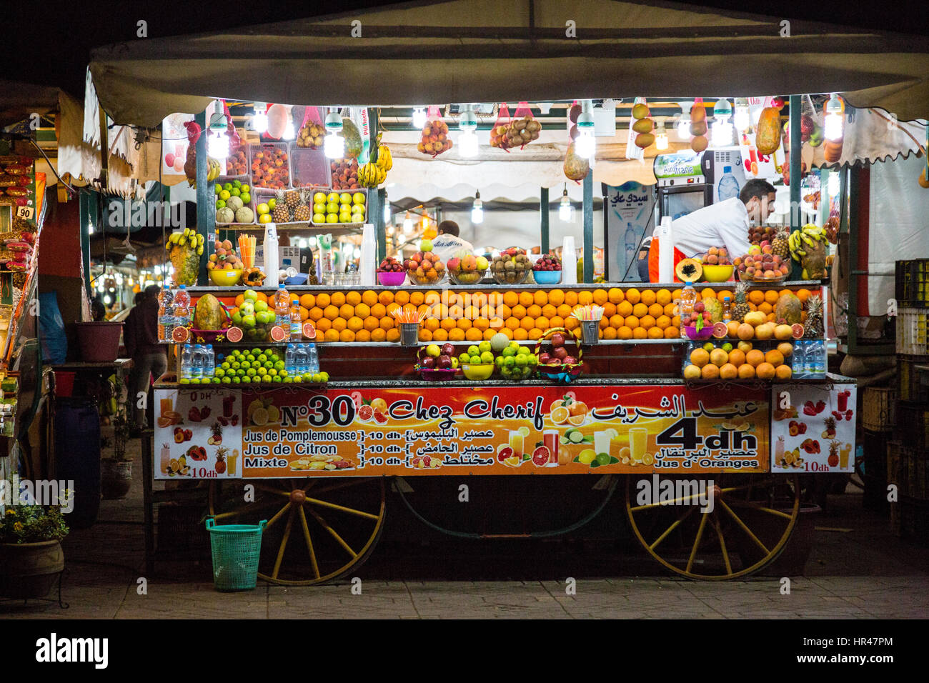 Marrakesh, Morocco. Vendor of Fruit and Juice Drinks in the Souk ...