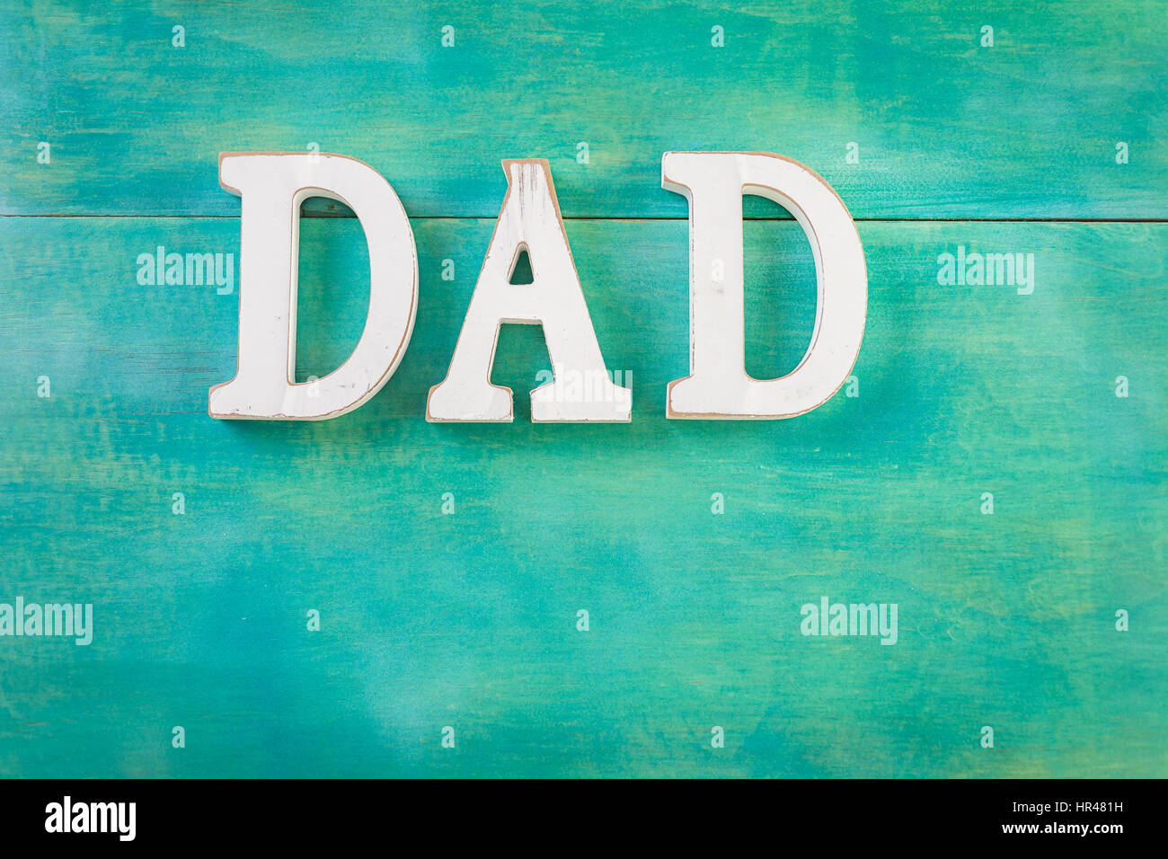White letters DAD on a painted wood background Stock Photo - Alamy