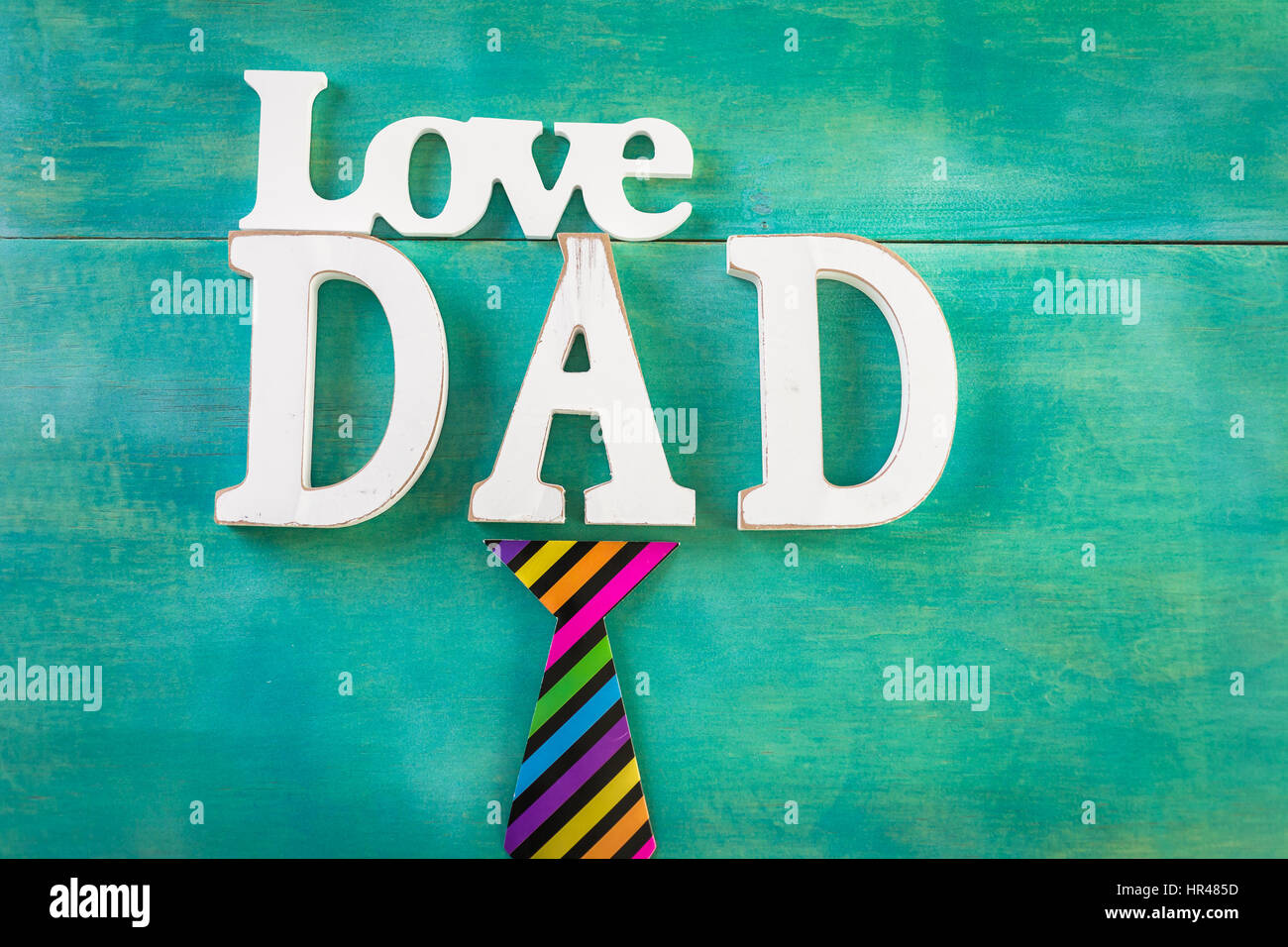 White letters DAD on a painted wood background Stock Photo - Alamy