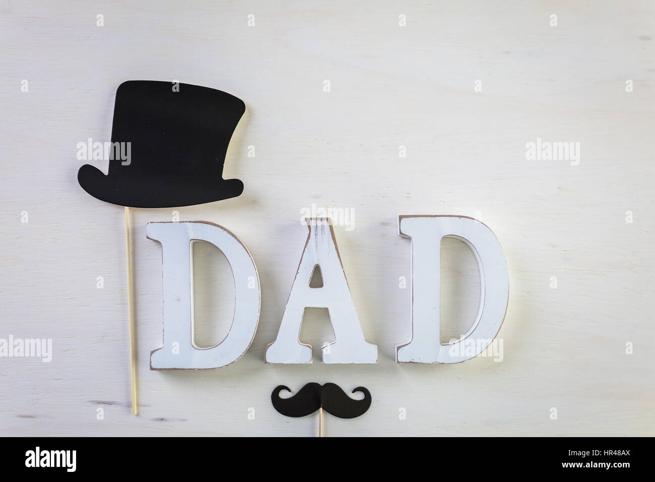 White letters DAD on a painted wood background Stock Photo - Alamy