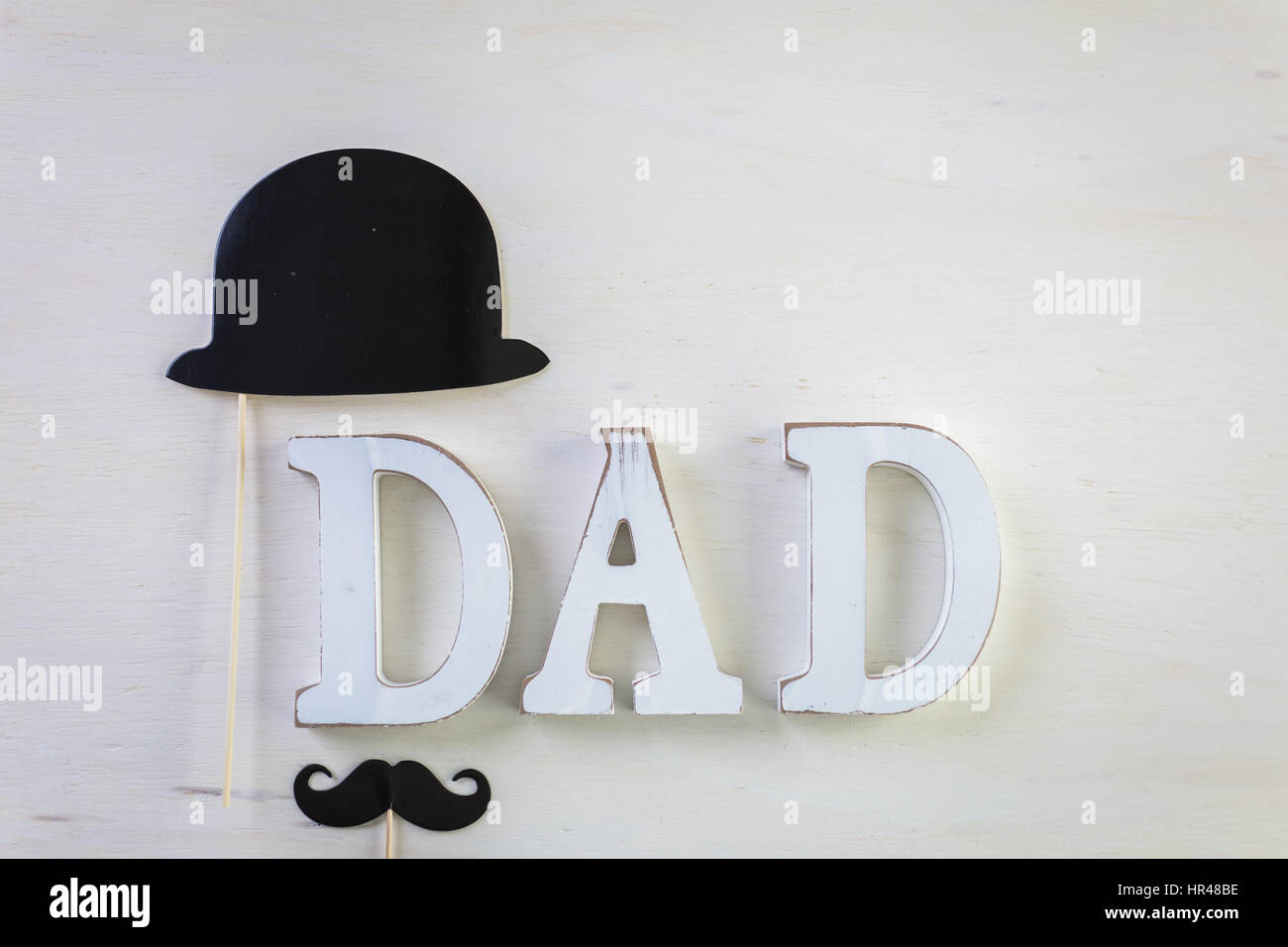 White letters DAD on a painted wood background Stock Photo - Alamy