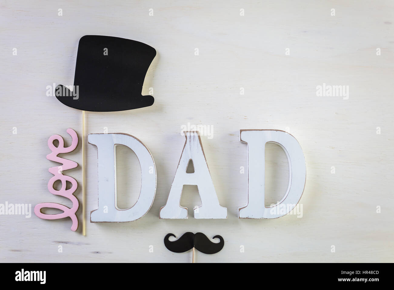 White letters DAD on a painted wood background Stock Photo - Alamy