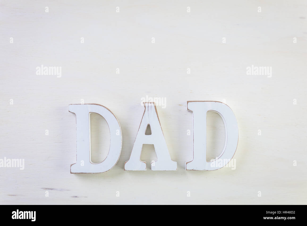 White letters DAD on a painted wood background Stock Photo - Alamy