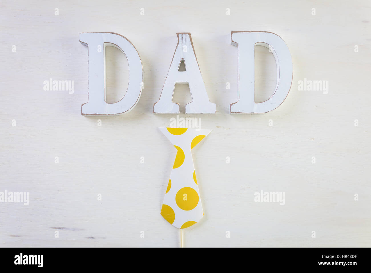 White letters DAD on a painted wood background Stock Photo - Alamy