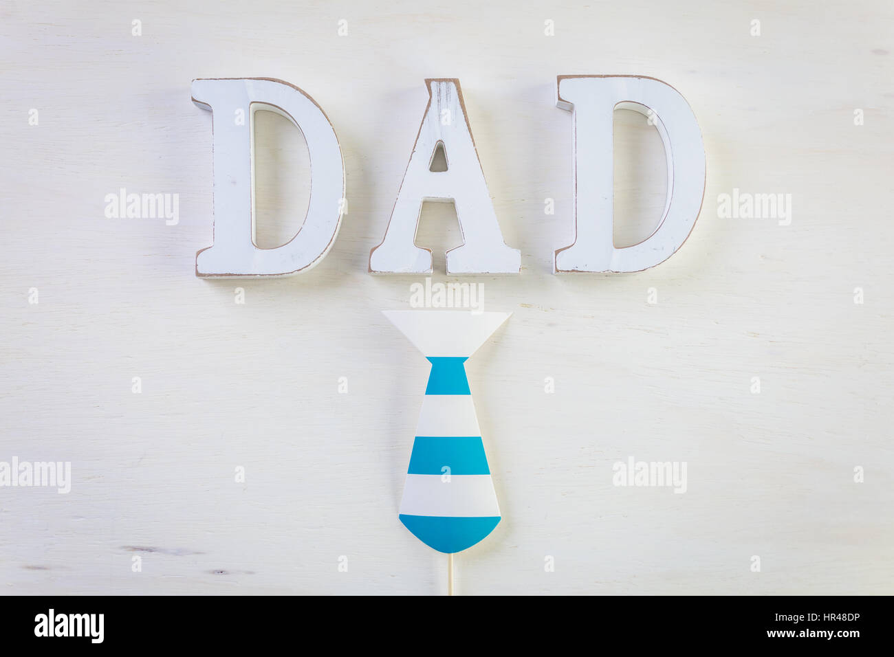 White letters DAD on a painted wood background Stock Photo - Alamy