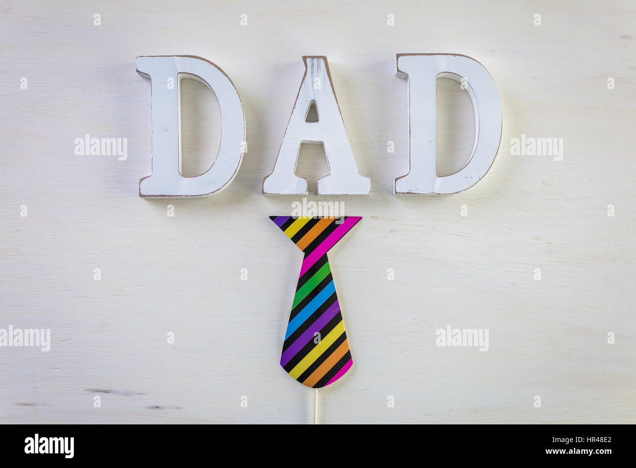 White letters DAD on a painted wood background Stock Photo - Alamy