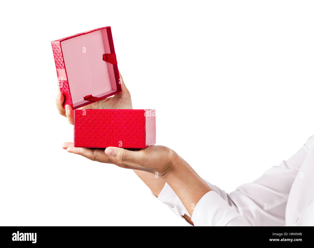 Hands holding an opened red gift box isolated on white background ...