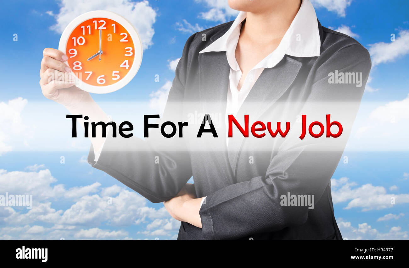 Time for a new job, and business woman holding clock on blue sky ...