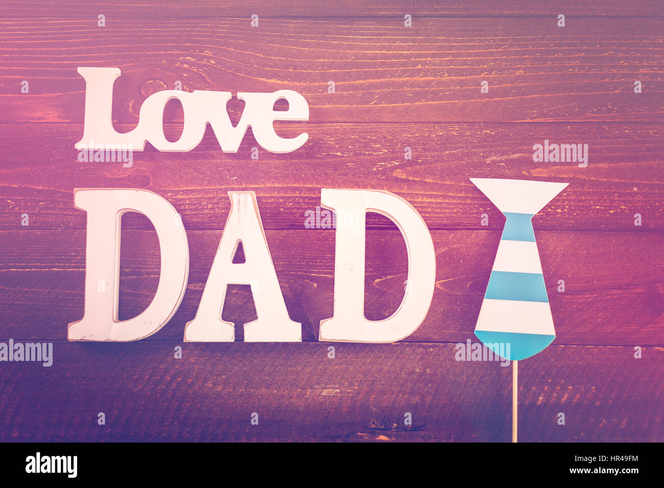 White letters DAD on a painted wood background Stock Photo - Alamy