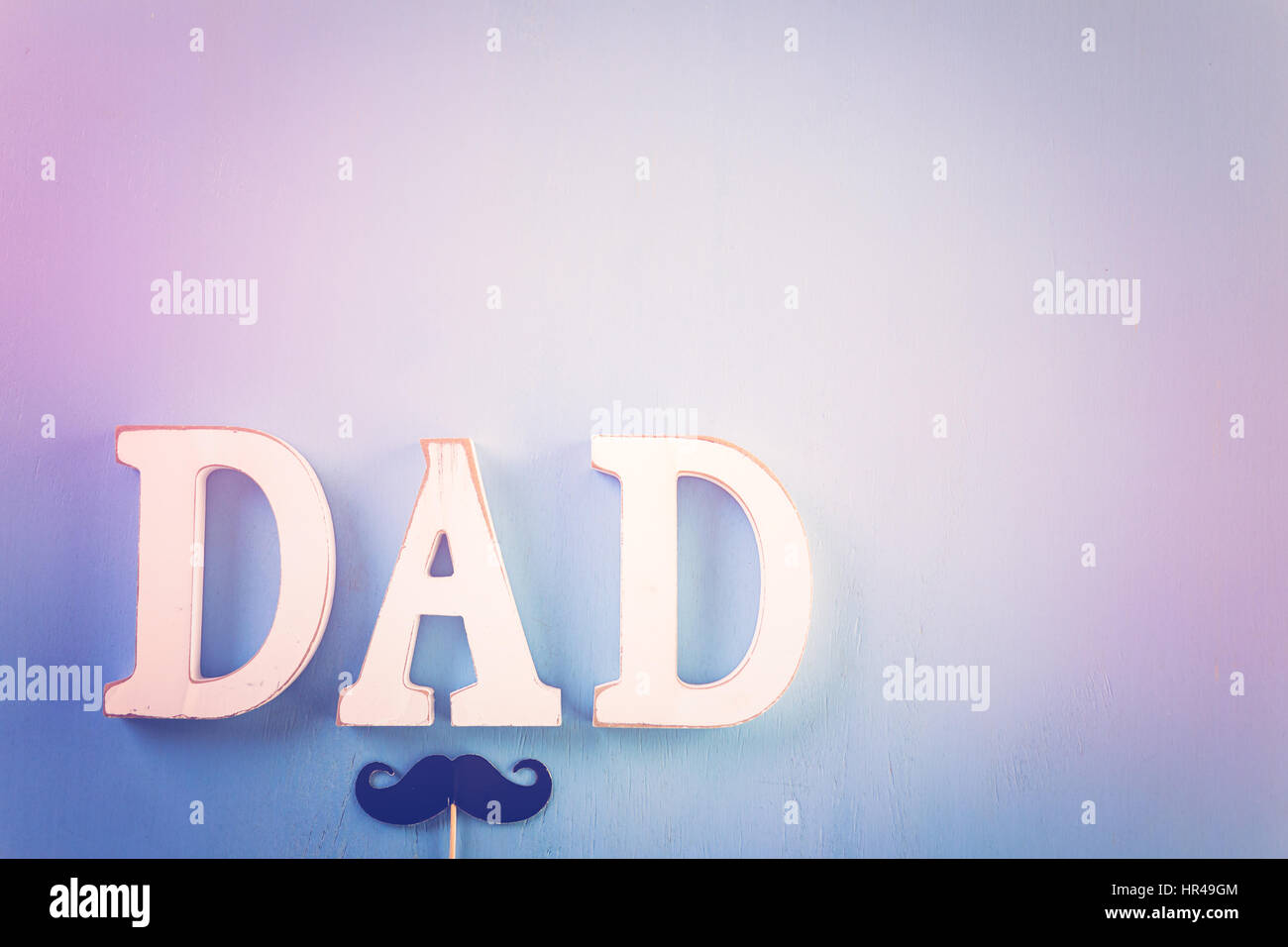 White letters DAD on a painted wood background Stock Photo - Alamy