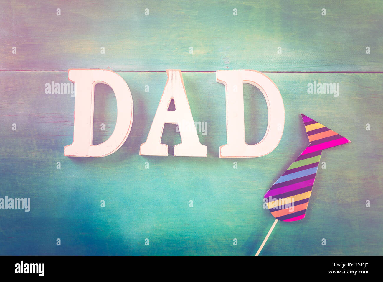 White letters DAD on a painted wood background Stock Photo - Alamy