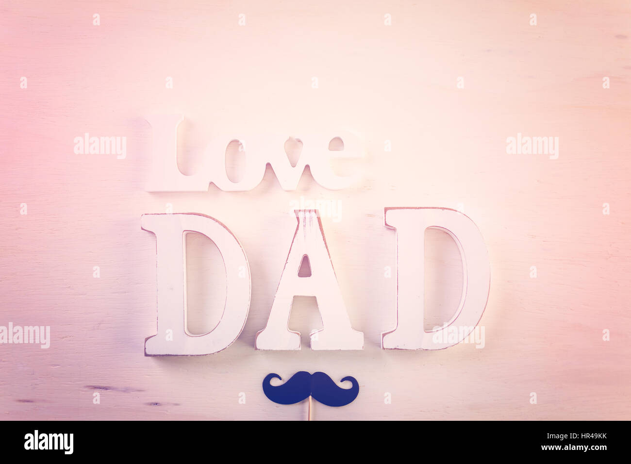 White letters DAD on a painted wood background Stock Photo - Alamy