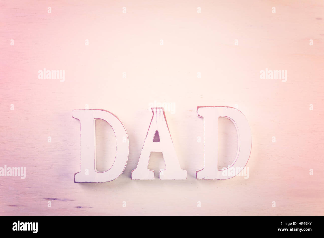 White letters DAD on a painted wood background Stock Photo - Alamy