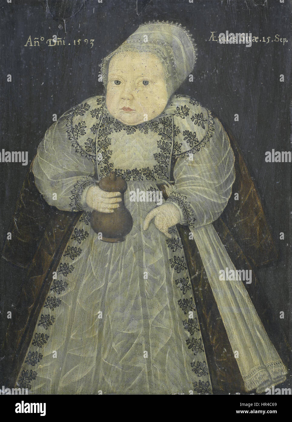 This 1593 portrait captures a child holding a feeding bottle, offering ...