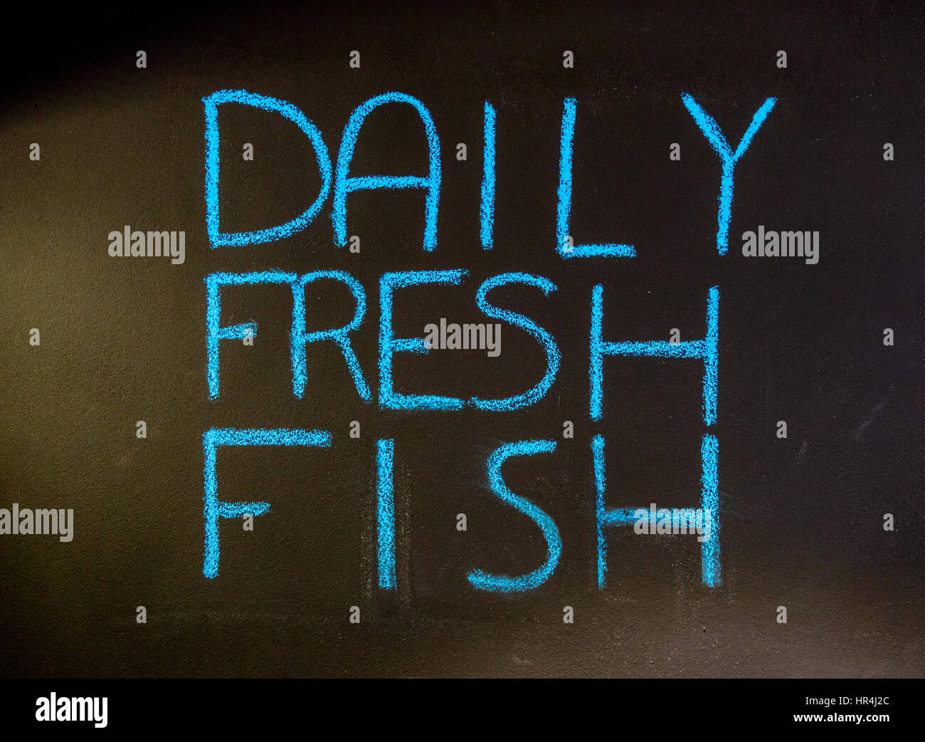 Daily Fresh Fish sign written in chalk on a chalk board in St Barts ...
