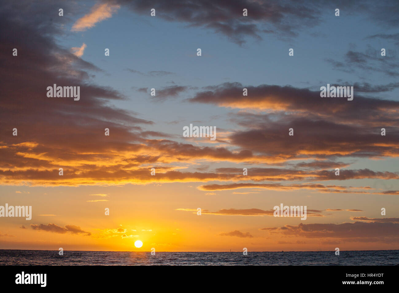 Minimalistic sunset landscape - sun, clouds, and sea Stock Photo - Alamy