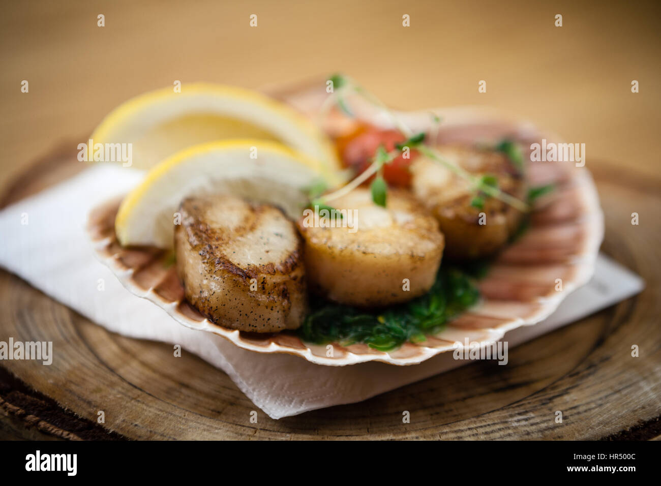 Fried scallops with vegetables Stock Photo - Alamy