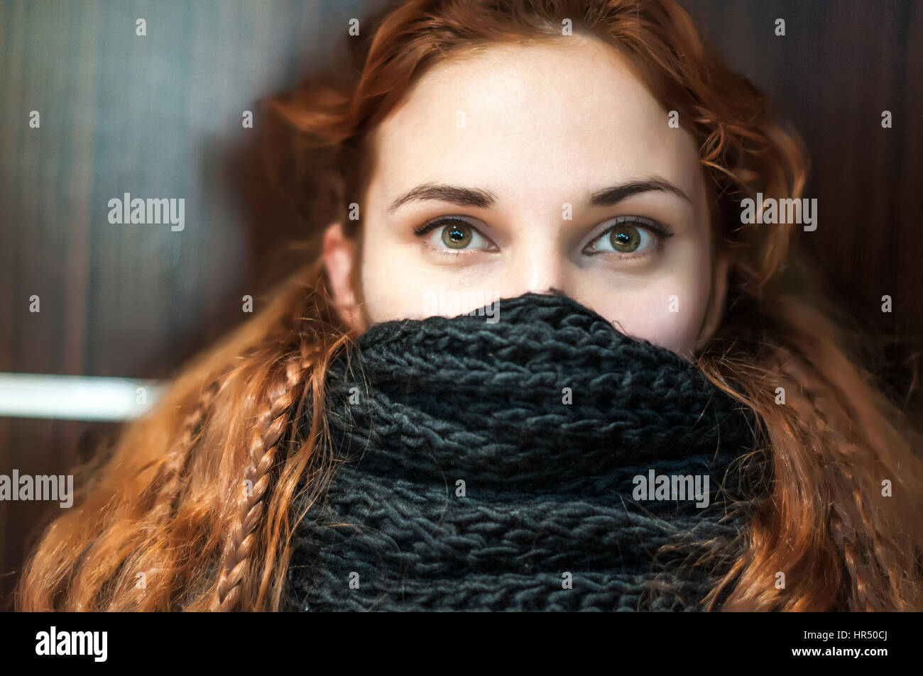 portrait of a woman with a black scarf covering the face, thick red ...