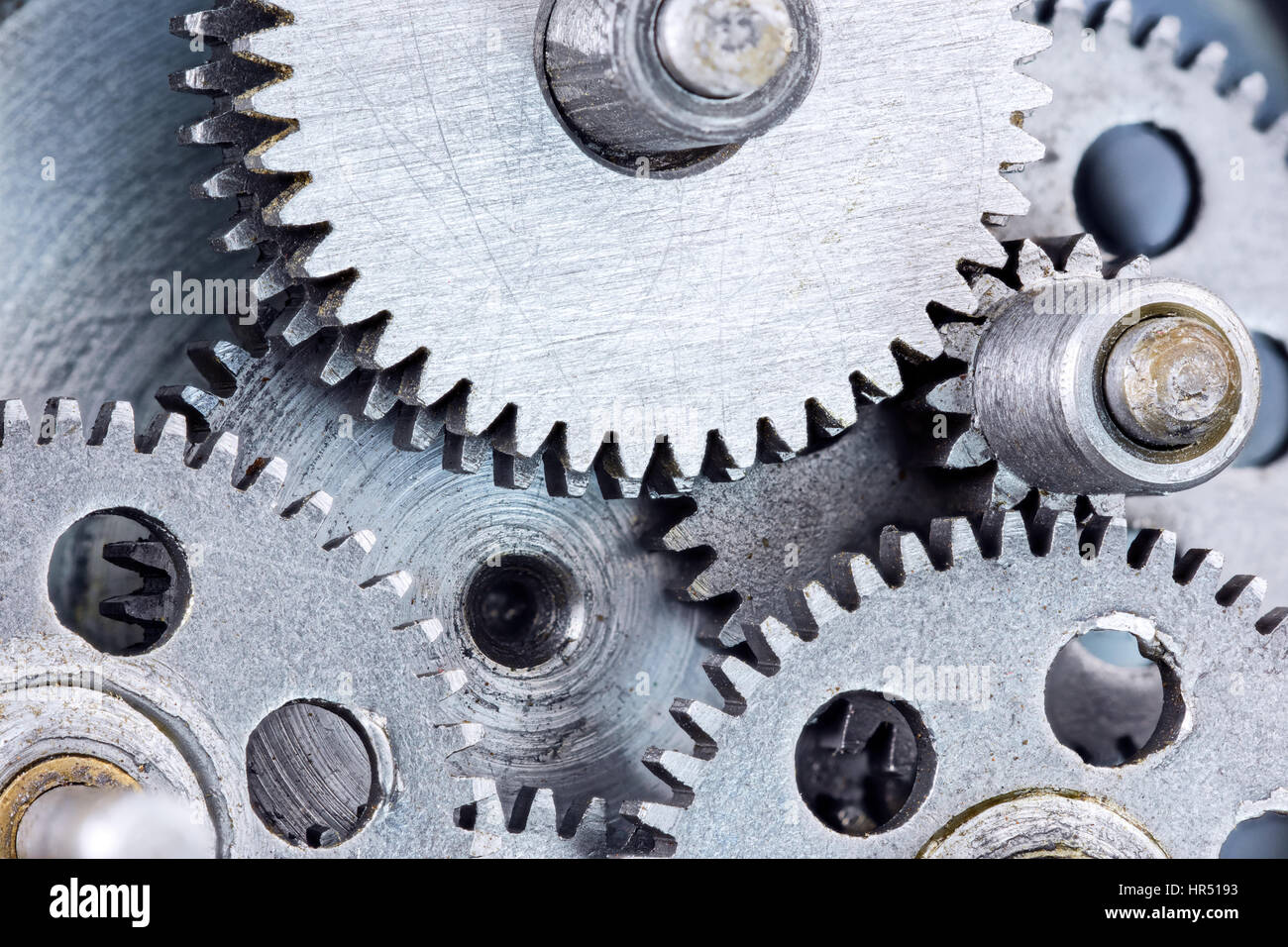scratched old metal gears for industry macro view Stock Photo - Alamy