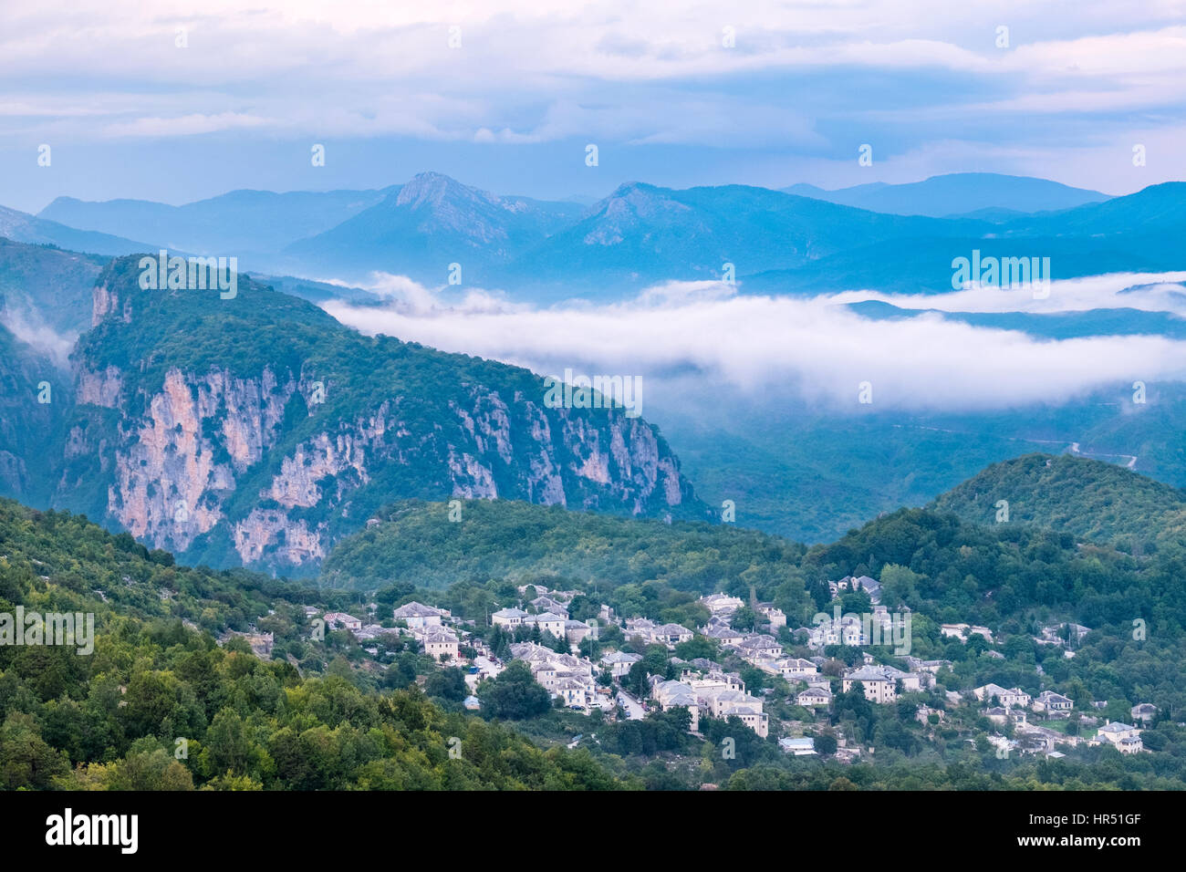 View of Pindus mountain range after sunset. Monodendri village on a ...