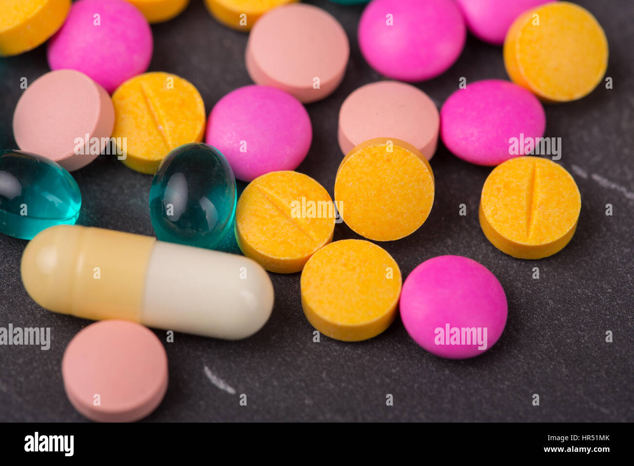 different tablets pills capsule heap mix therapy drugs Stock Photo - Alamy