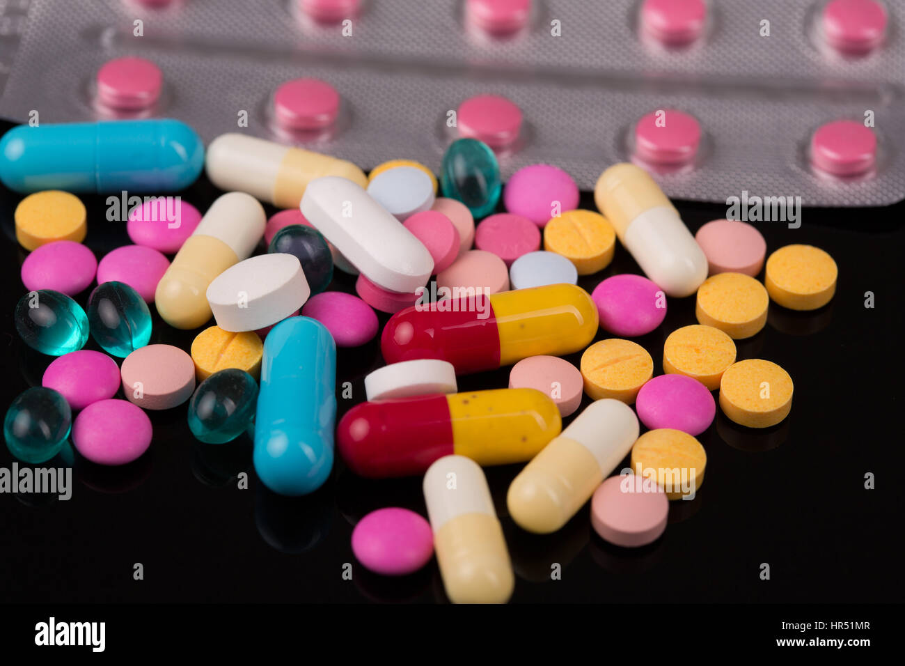 different tablets pills capsule heap mix therapy drugs Stock Photo - Alamy
