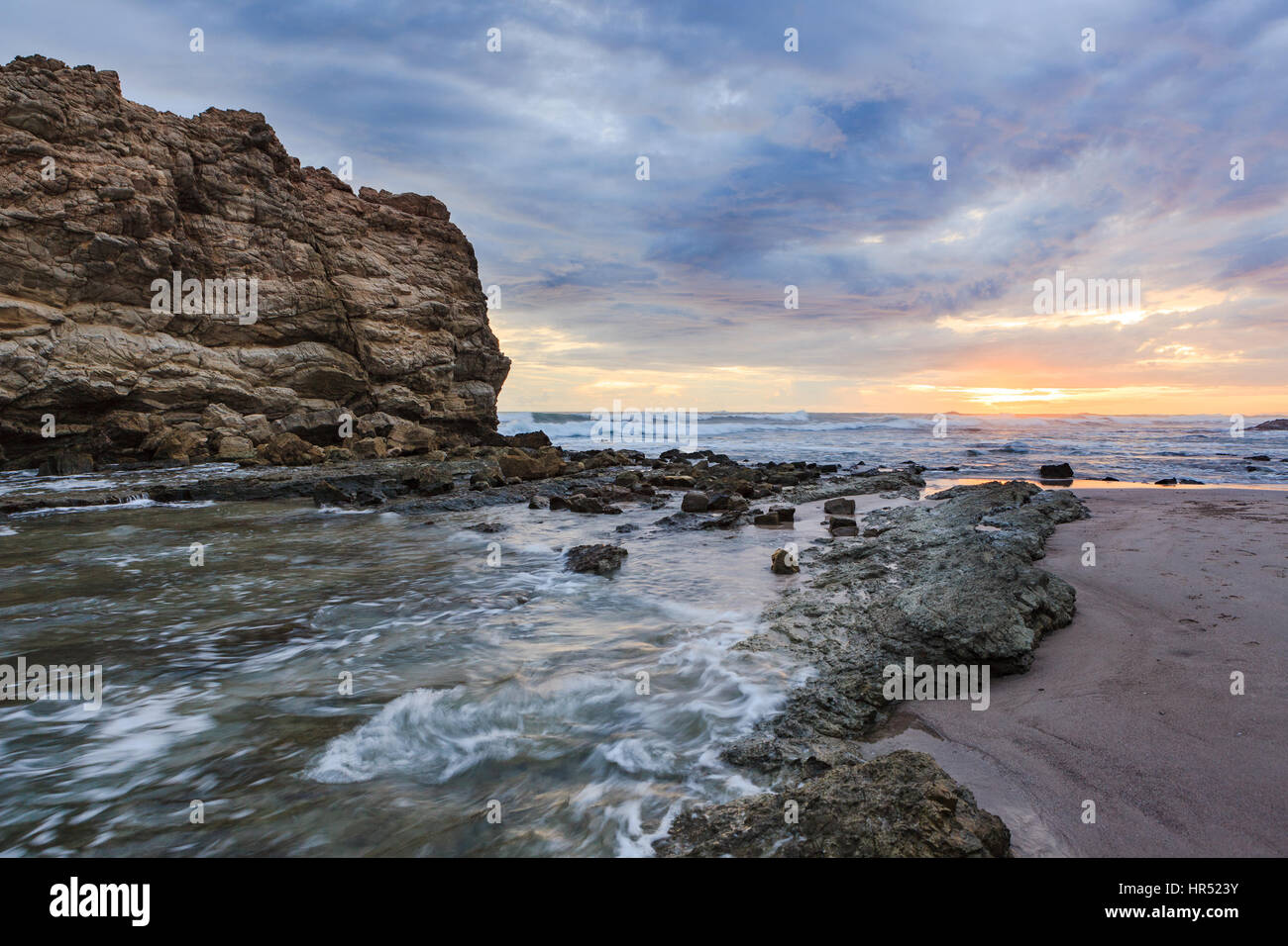 Big rock beach sunset long exposure at Santa Teresa Costa Rica Stock ...