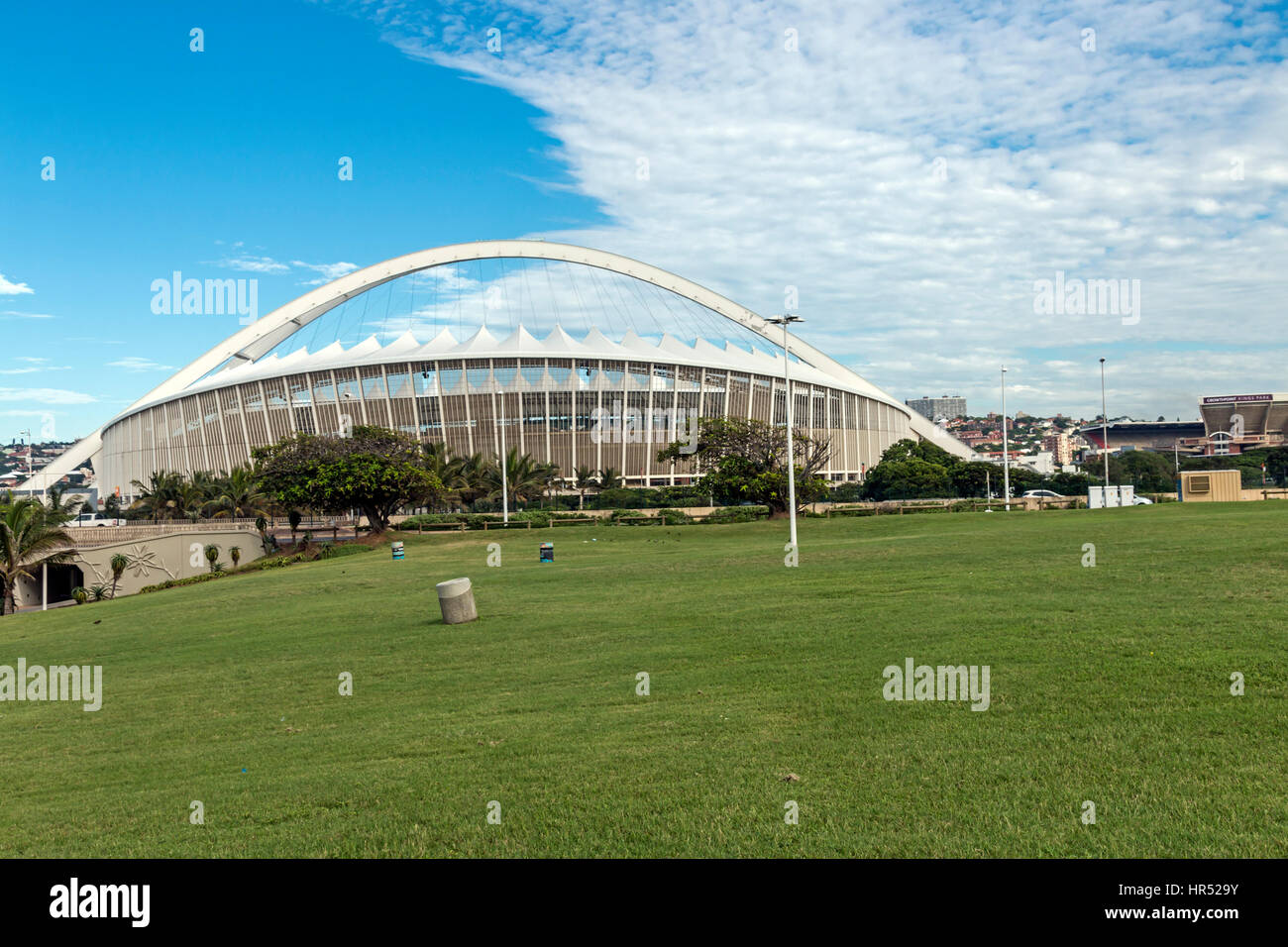 DURBAN, SOUTH AFRICA - FEBRUARY 24, 2017: Early morning, green grass ...