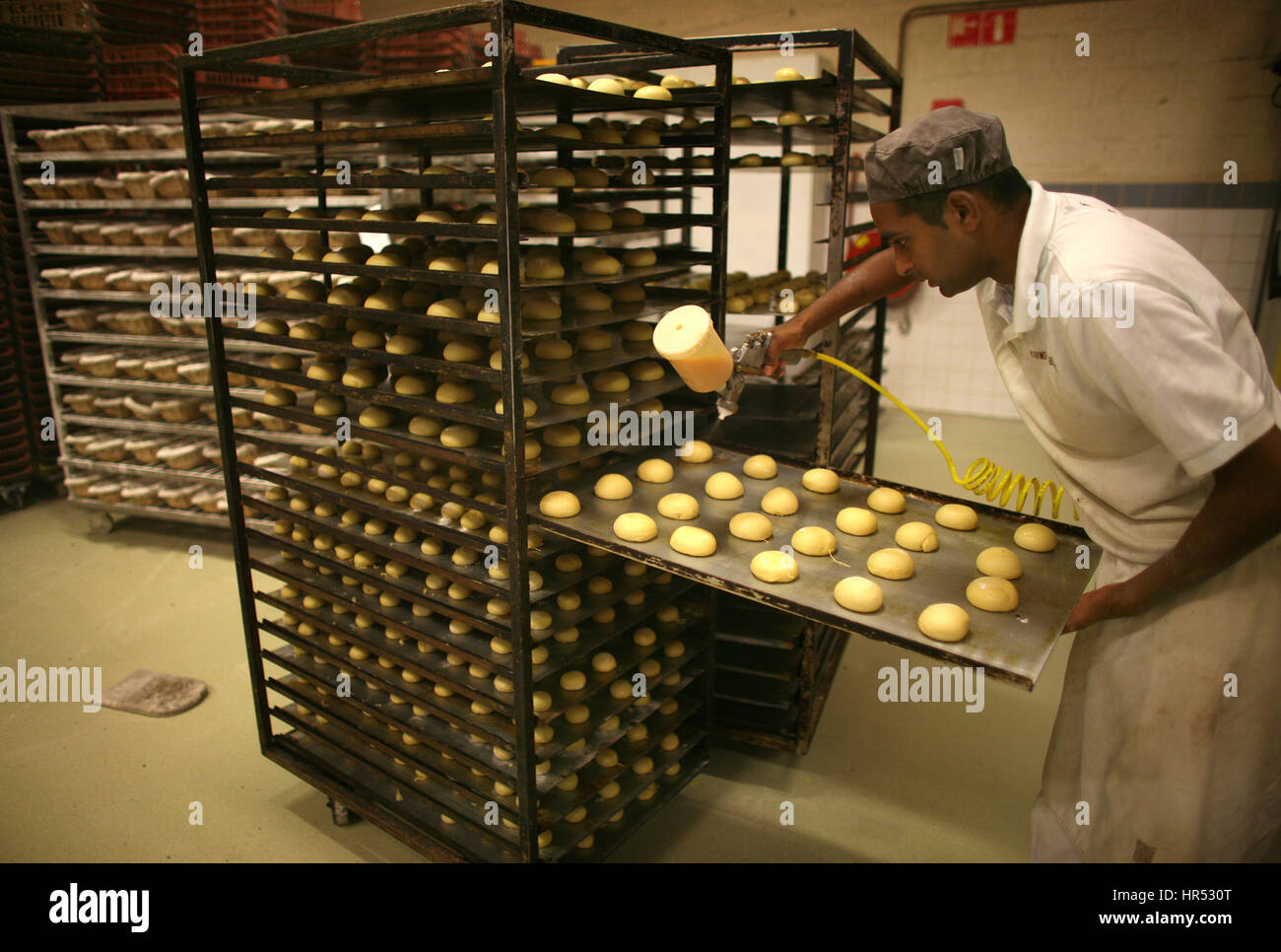 Baker at work hi-res stock photography and images - Alamy