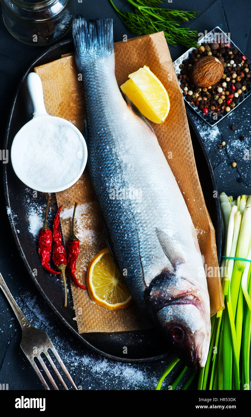 raw fish with spice and fresh salad Stock Photo - Alamy
