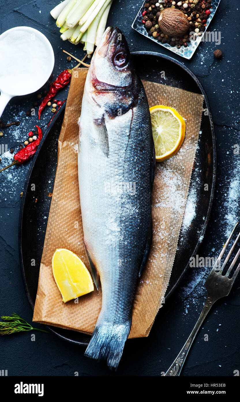 raw fish with spice and fresh salad Stock Photo - Alamy