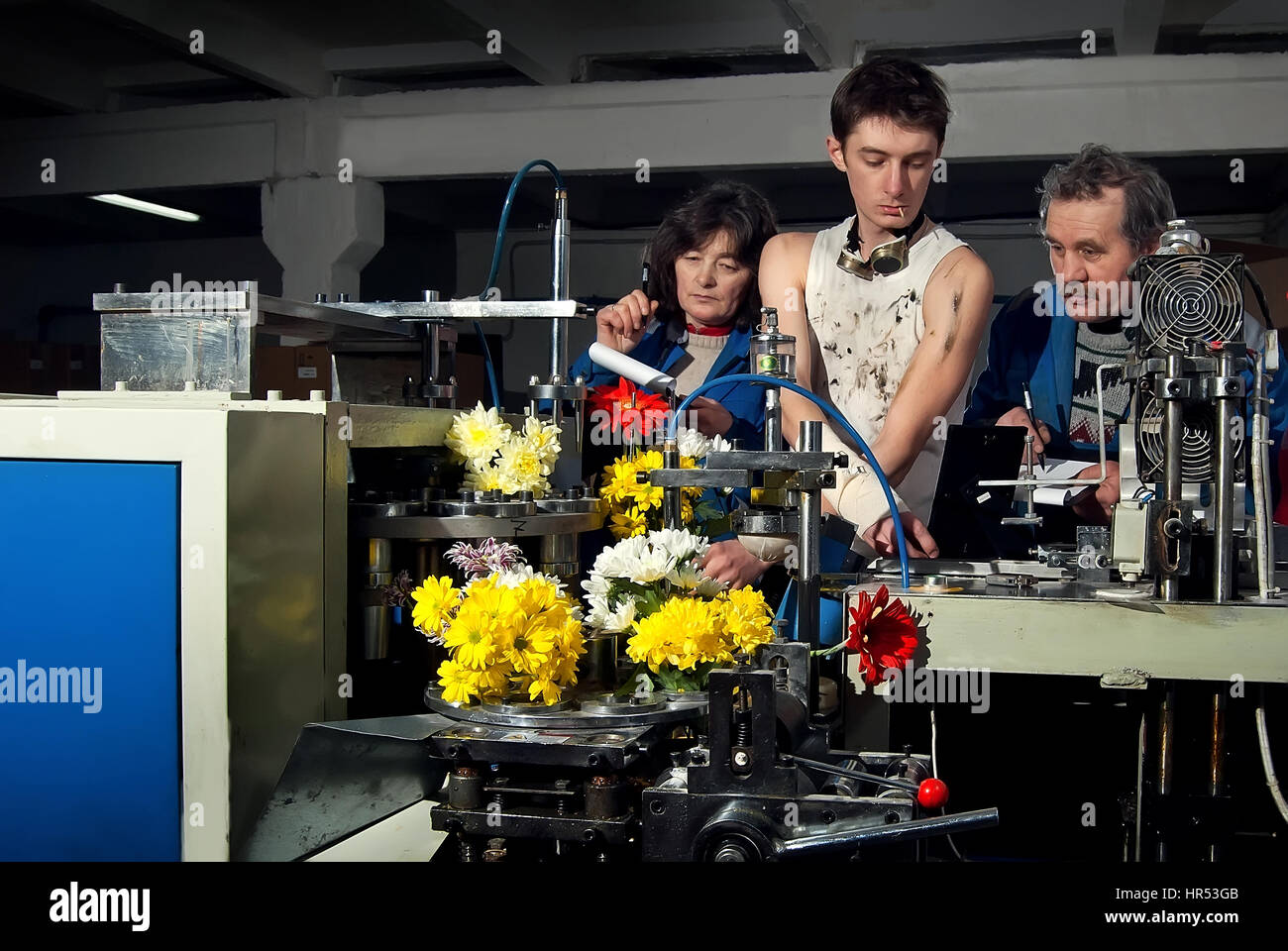Flowers on the production of machines at the factory with the control ...