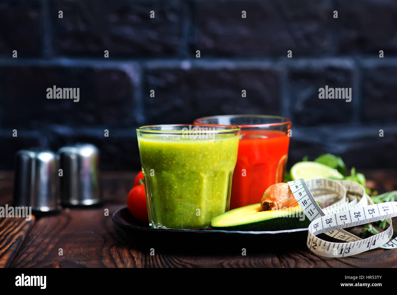 smoothies in glass and on a table Stock Photo - Alamy