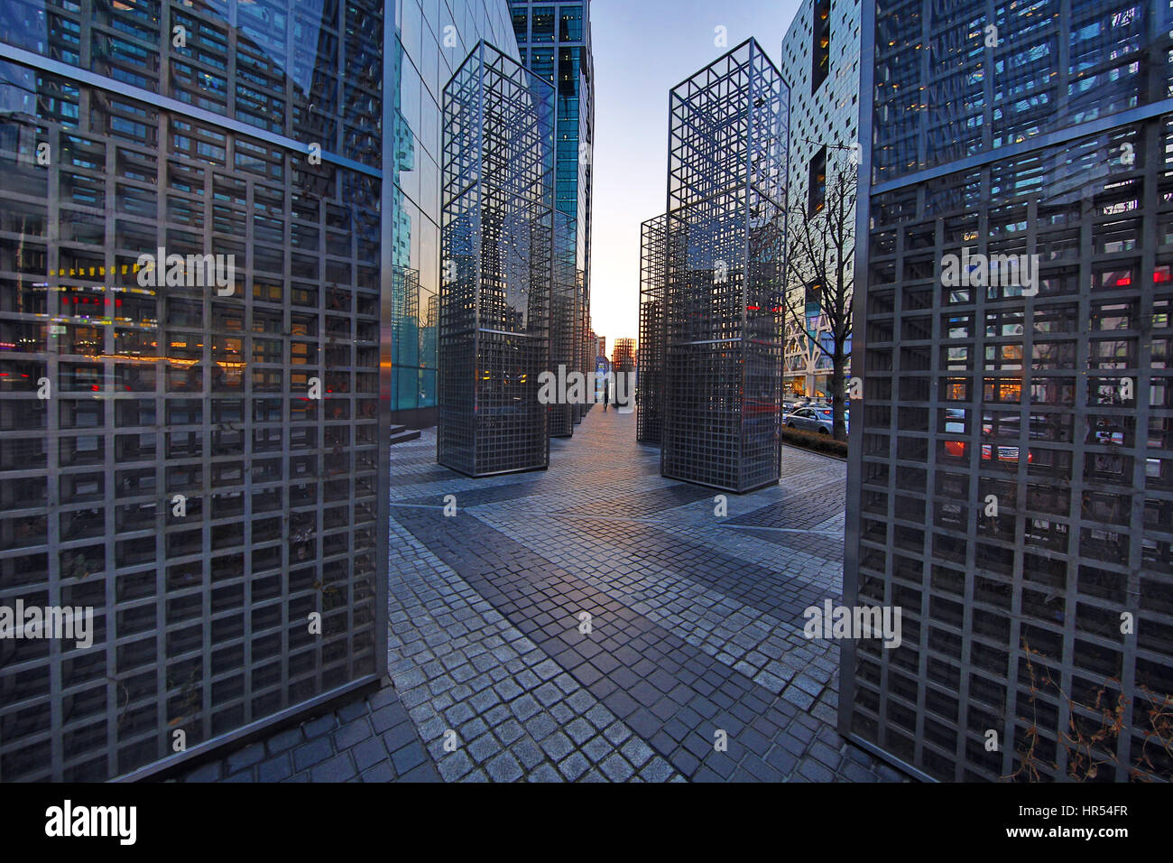 Metal structures beside the office blocks at dusk in the Gangnam ...