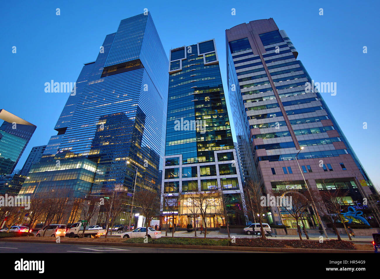 Tall modern buildings and office blocks at dusk in the Gangnam district ...