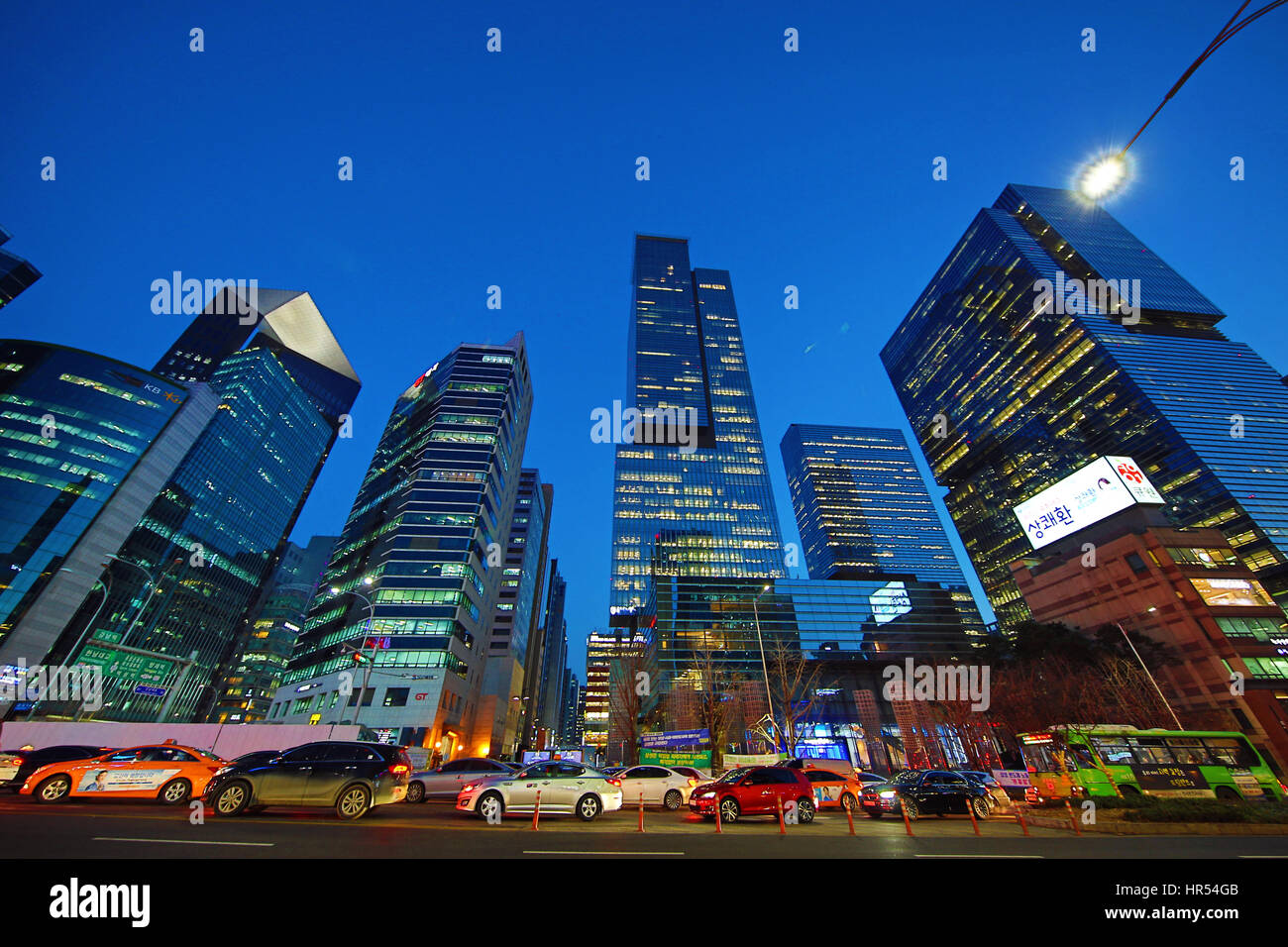 Tall modern buildings and office blocks at dusk in the Gangnam district ...