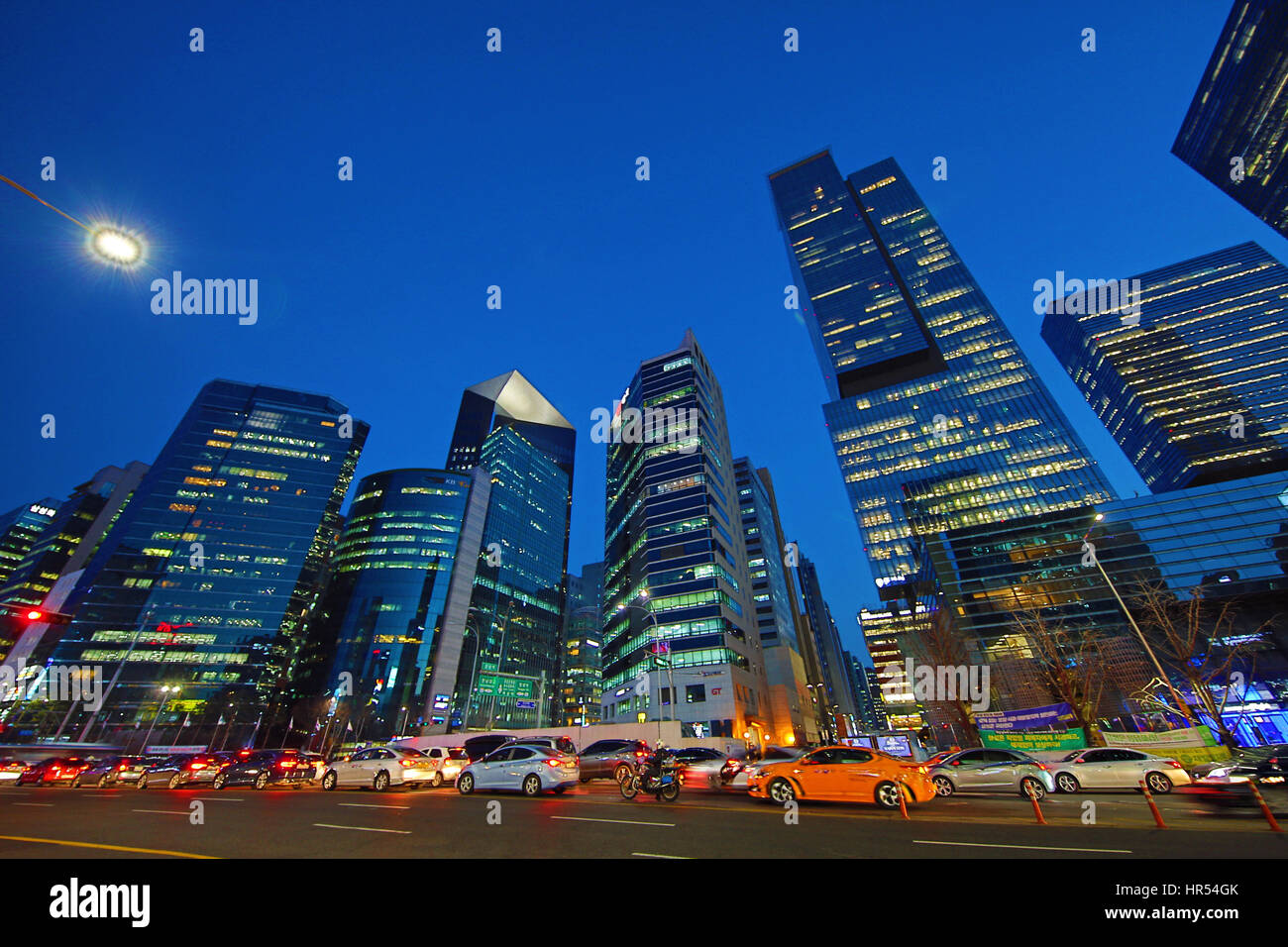 Tall modern buildings and office blocks at dusk in the Gangnam district ...