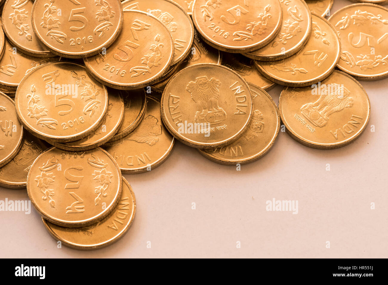 Pile of Indian coins on white background Stock Photo - Alamy