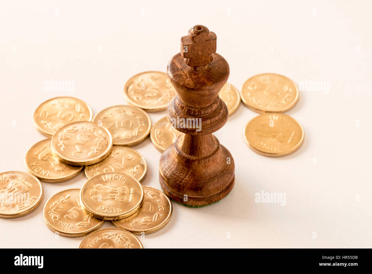Indian coins with chess king Stock Photo - Alamy