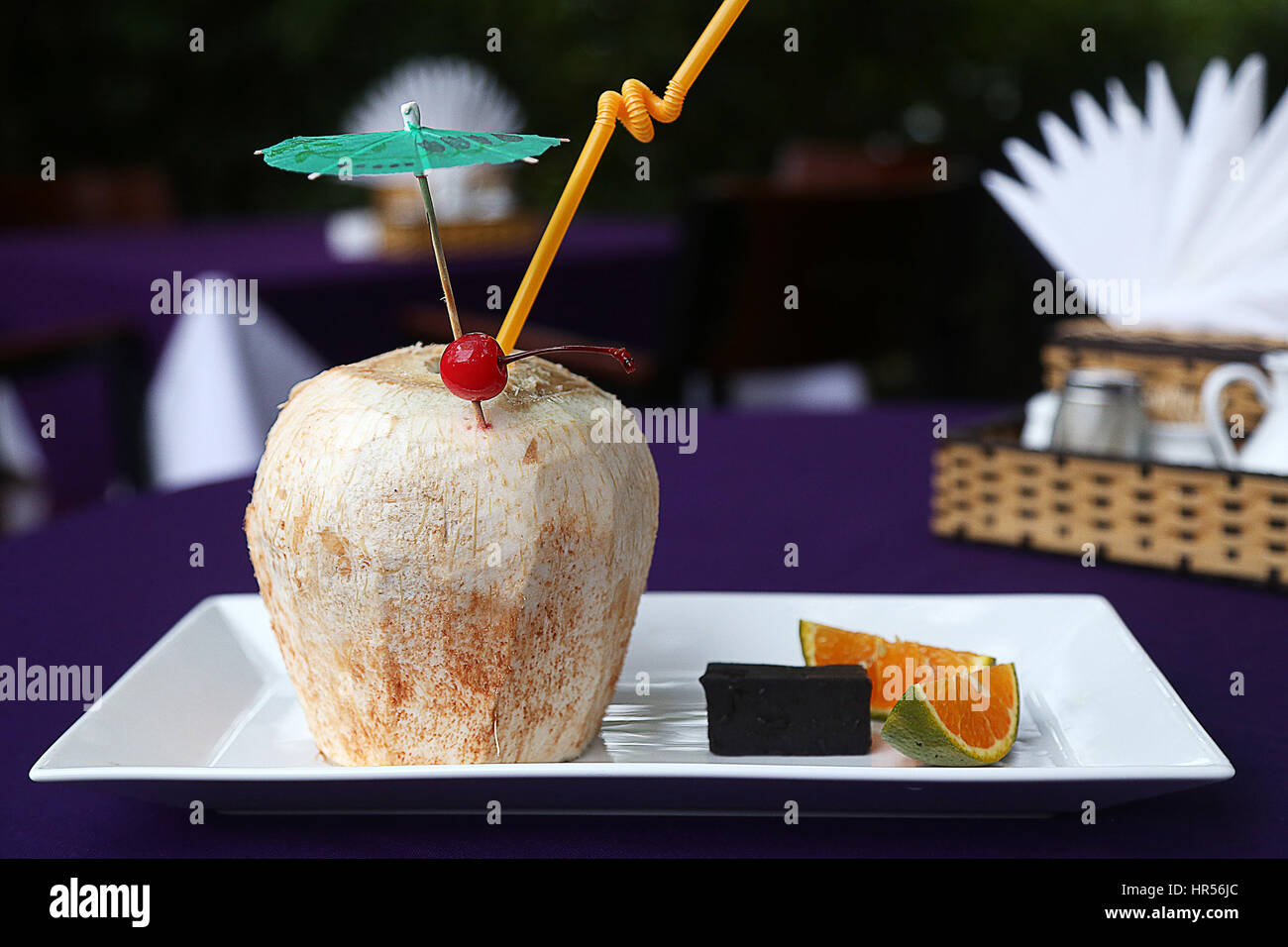 Alcoholic coconut cocktail on a plate Stock Photo - Alamy