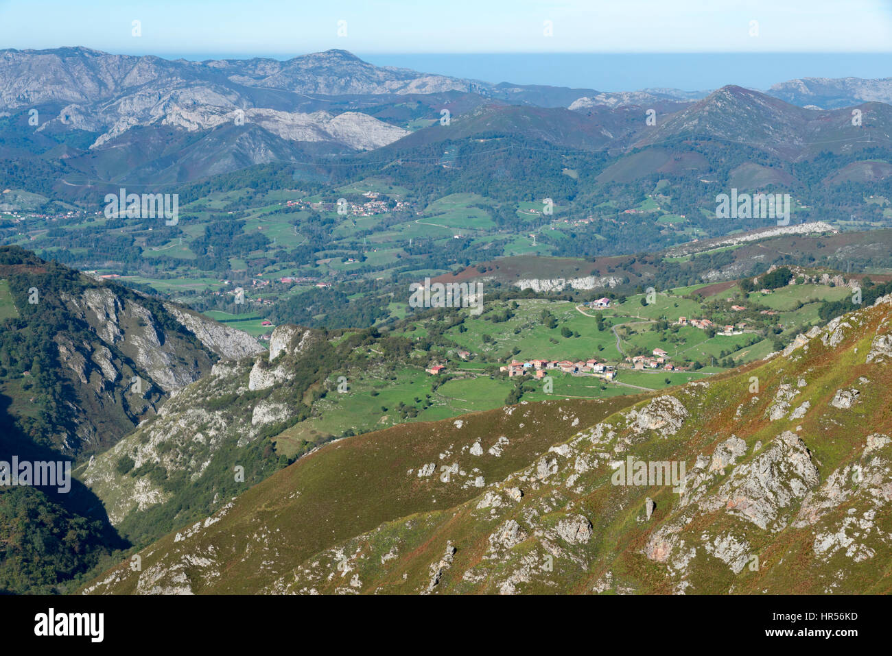 A landscape view of limestone hills and mountains with houses, villages ...