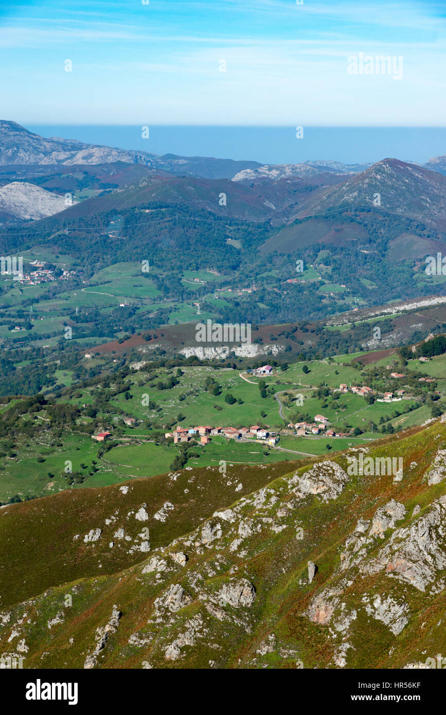 A landscape view of limestone hills and mountains with houses, villages ...