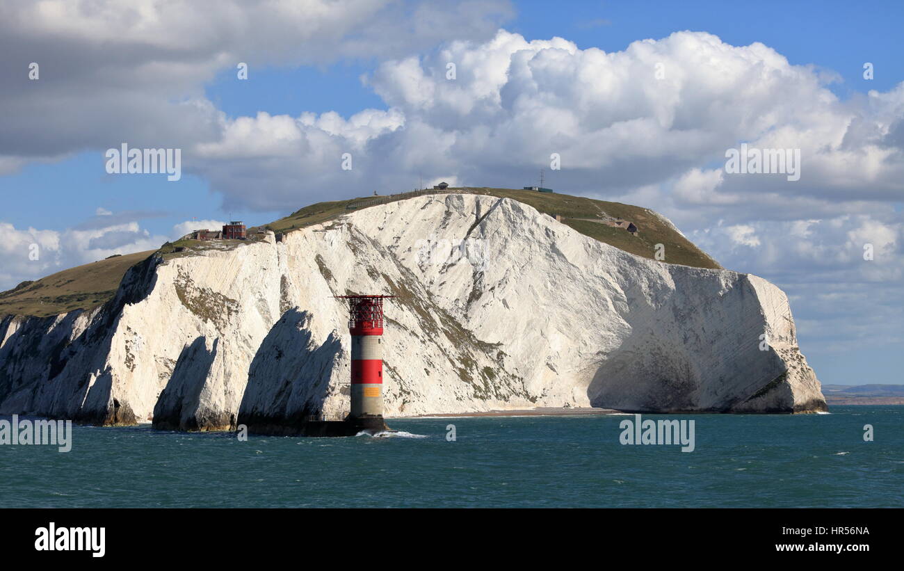 Imposing red and white Trinity Lighthouse tipping the familiar Needles ...