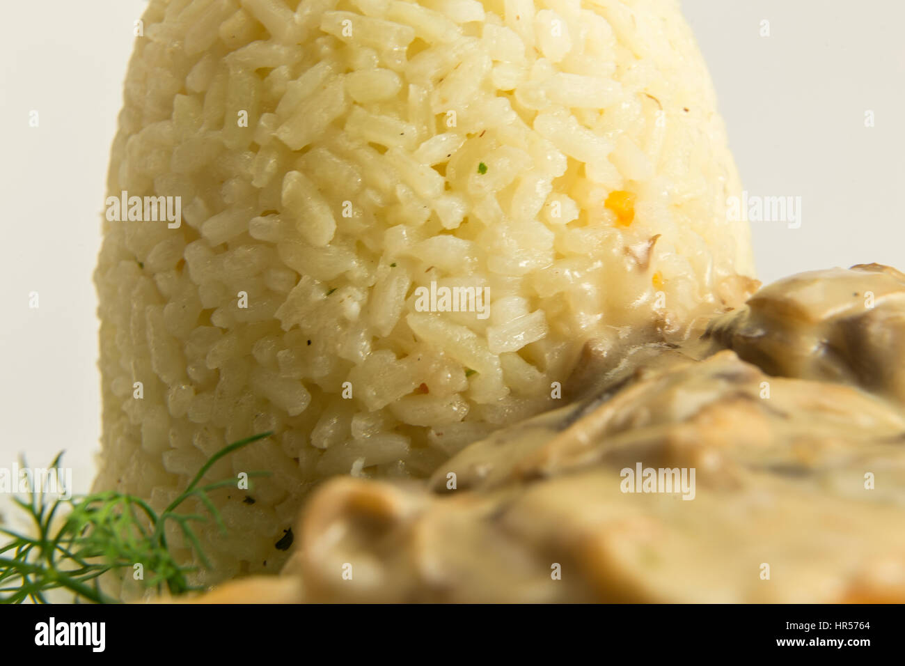 rice with sauce served on a plate Stock Photo - Alamy