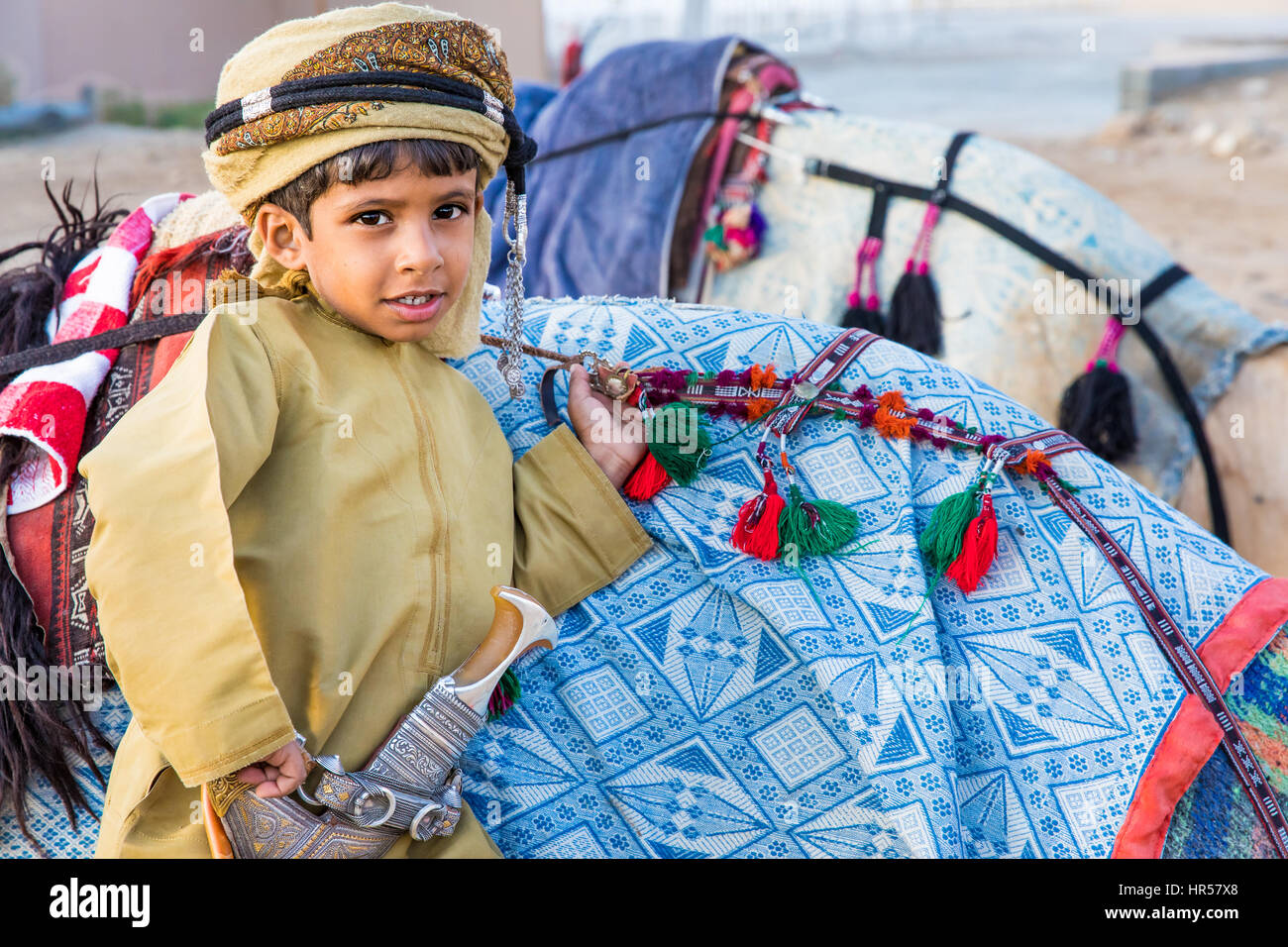 Muscat, Oman - Feb 4, 2017: Young Omani boy dressed in traditional ...