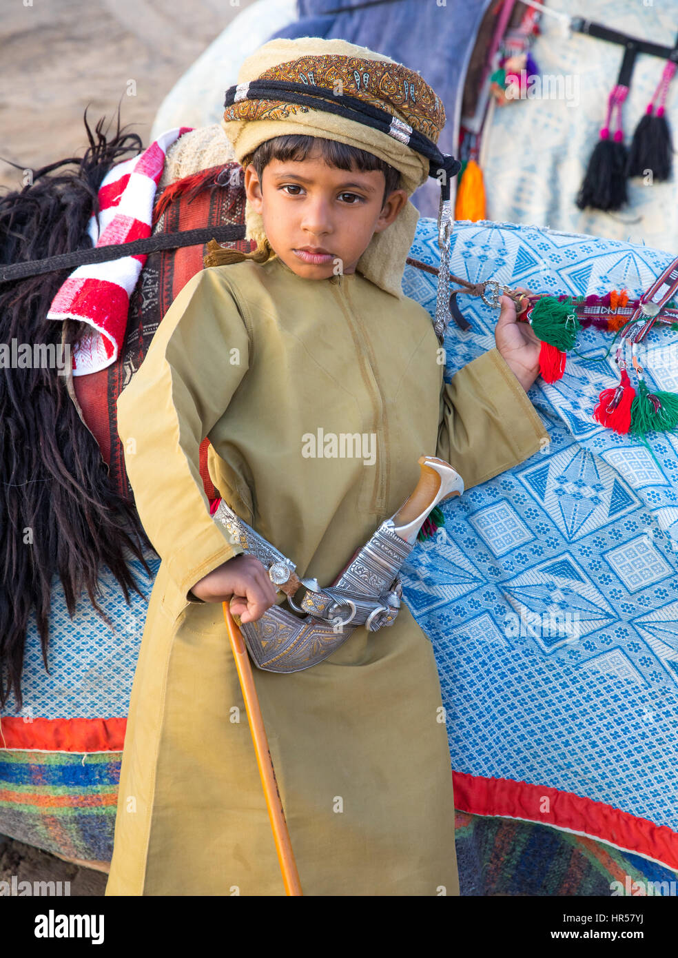 Muscat, Oman - Feb 4, 2017: Young Omani boy dressed in traditional ...